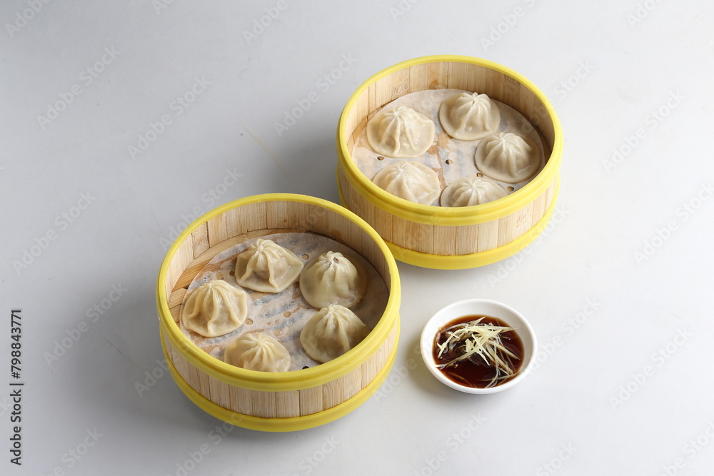 handmade steamed Shanghai Xiao long bao pork meat dumpling soup in bowl ...
