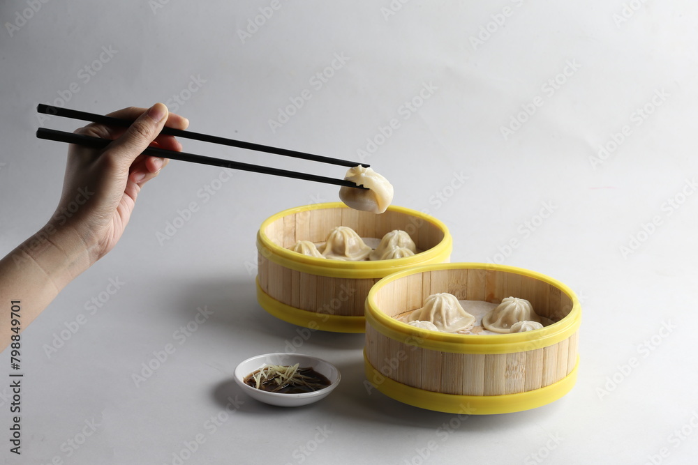 handmade steamed Shanghai Xiao long bao pork meat mini dumpling soup in ...