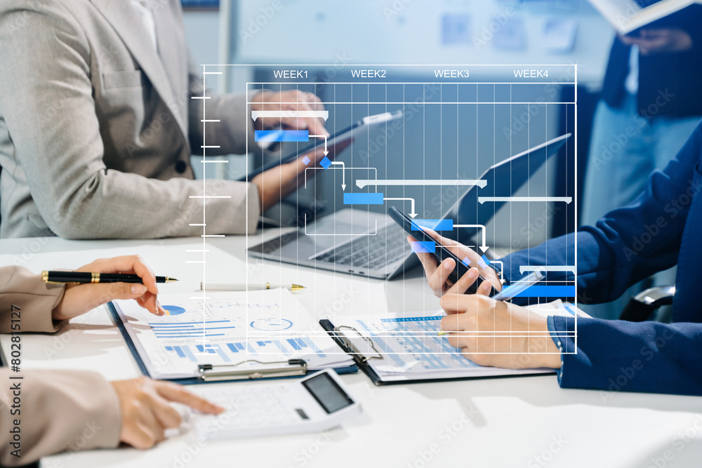 Project manager working and update tasks with milestones progress ...