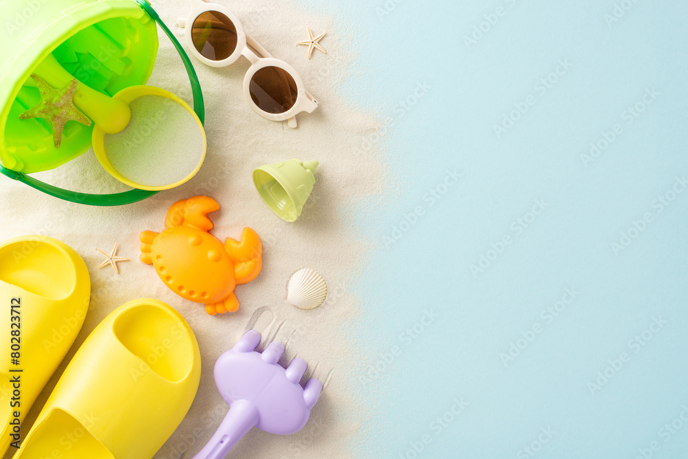 Kids' summer excursion. Top view of beach play set: bucket, rake, sea ...