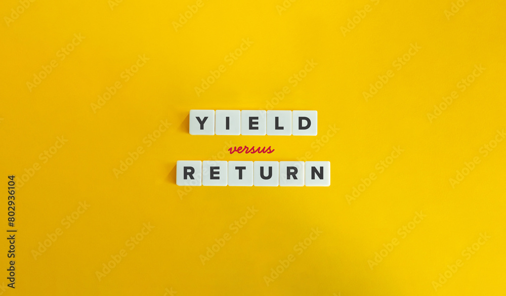 Yield versus Return Banner. Text on Block Letter Tiles on Flat ...