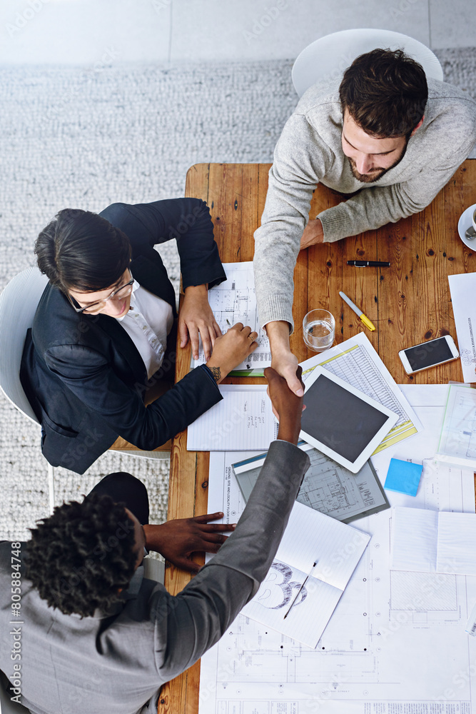 Above, business people and handshake after meeting or presentation ...