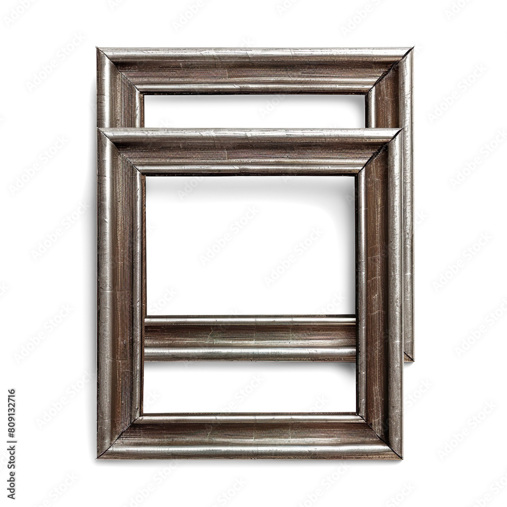 two vertical standing empty square aluminium photo frames with wide ...