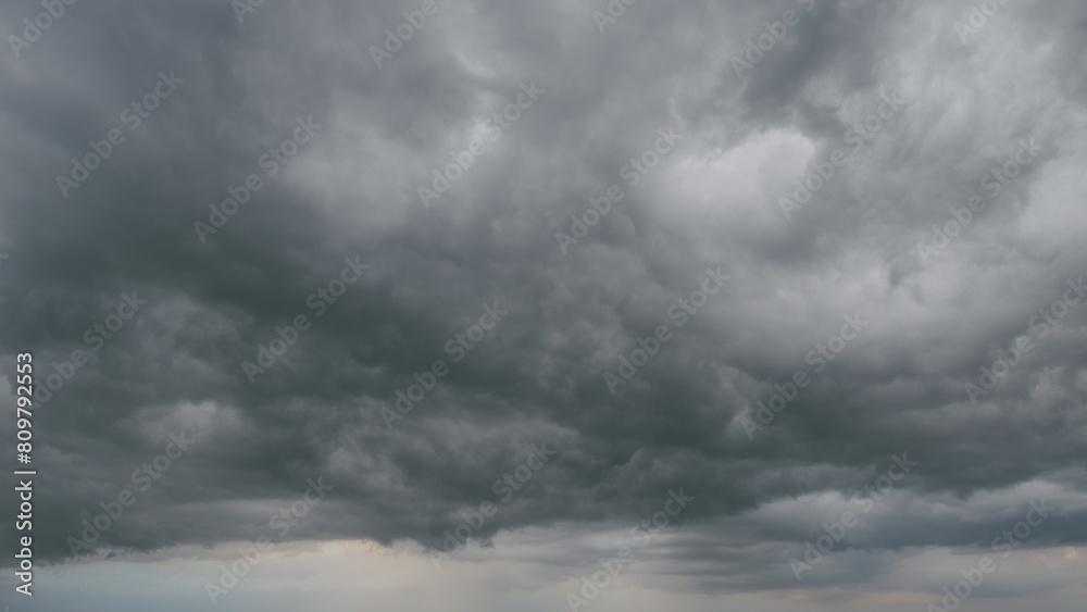Heavy rain is coming. Cumulus dark clouds harbinger of bad weather and ...
