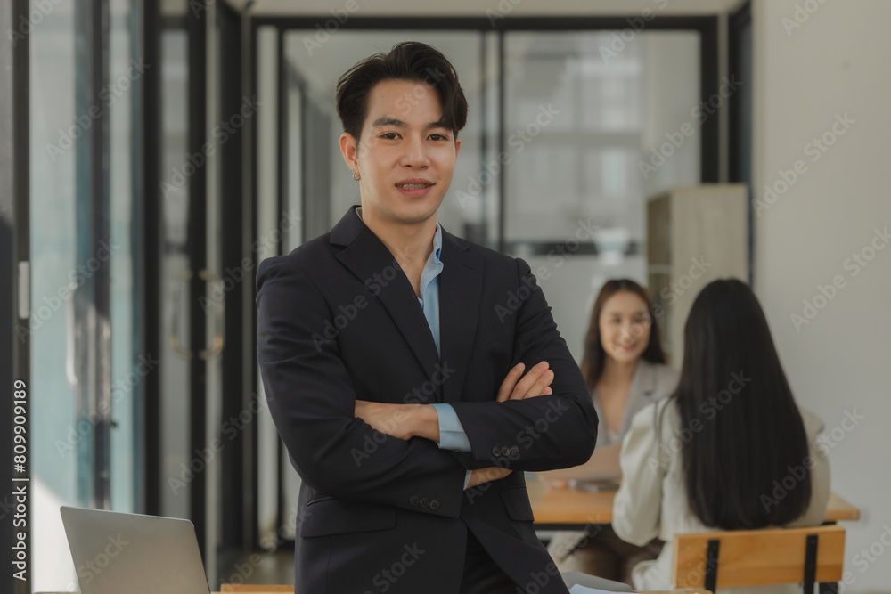 picture of businesspeople is looking into the camera in the office ...