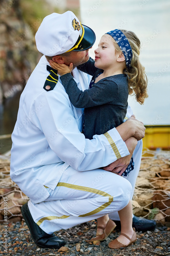 Father, navy and child hug with love for family reunion at sea dock or ...