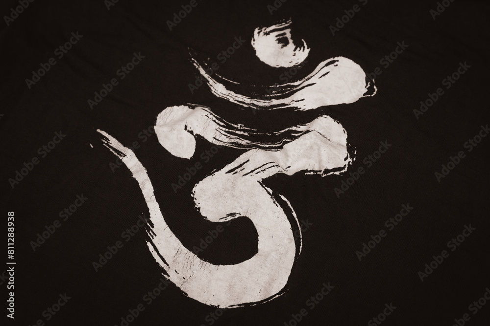 Om word on dark background. Spiritual sign isolated. Sacred Om symbol ...
