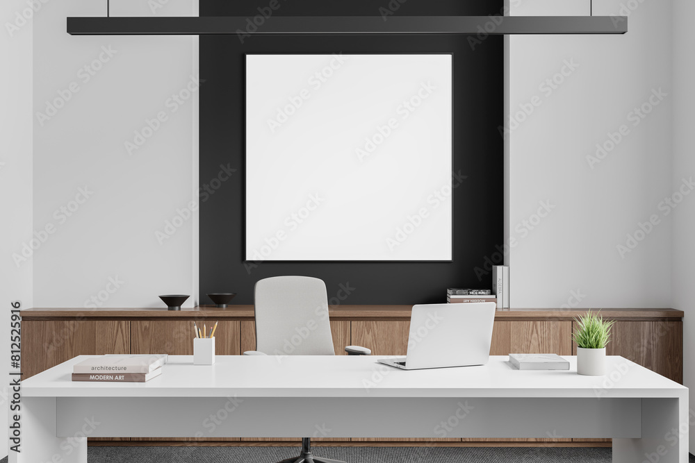 Stylish ceo interior work desk with laptop and sideboard. Mockup frame ...