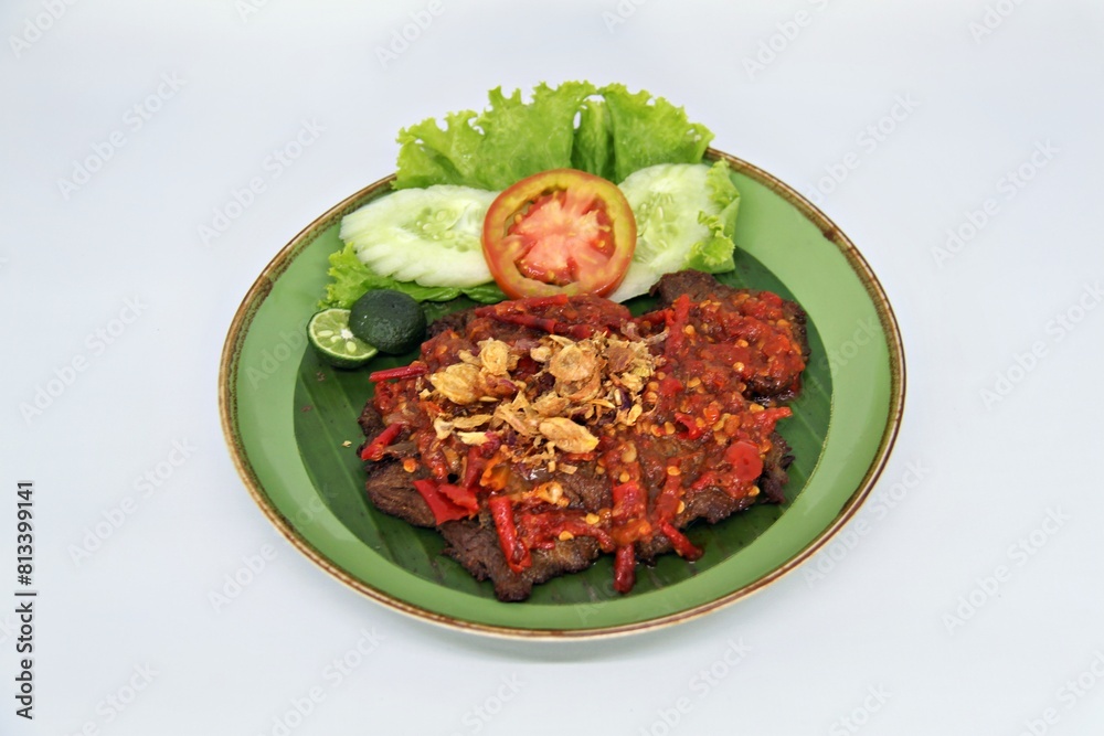 Empal Penyet consists of deep-seated beef cooked with kitchen spices ...