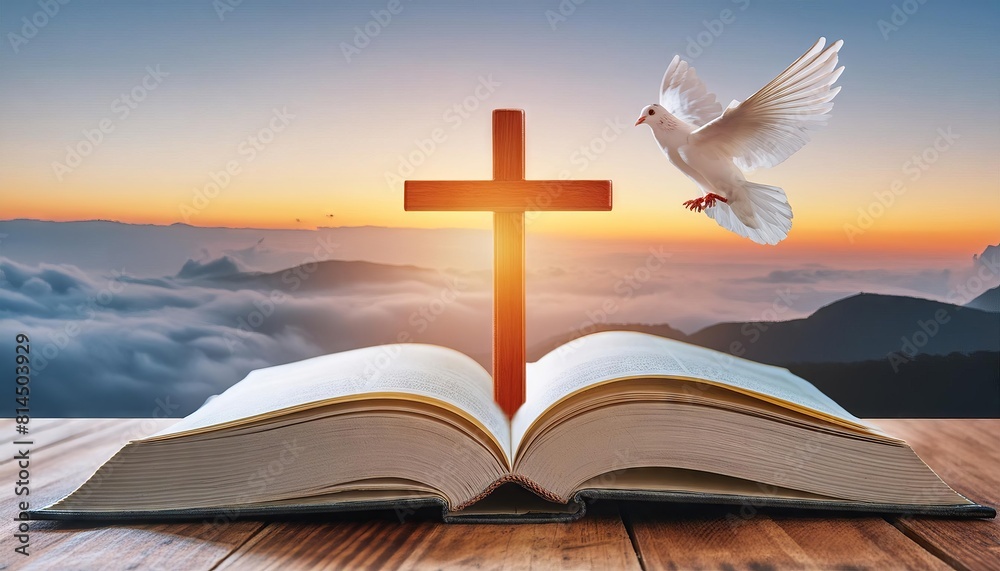 The cross of Jesus Christ on the background of the open Bible and the ...