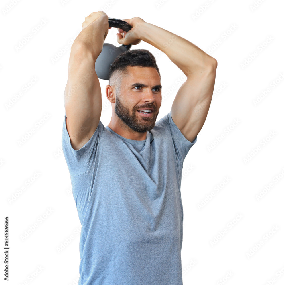 Fit and muscular man focused on lifting a dumbbell during an exercise ...