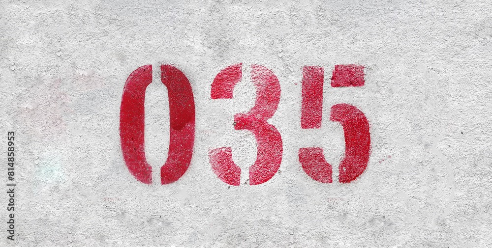 Red Number 035 on the white wall. Spray paint. Stock Photo | Adobe Stock