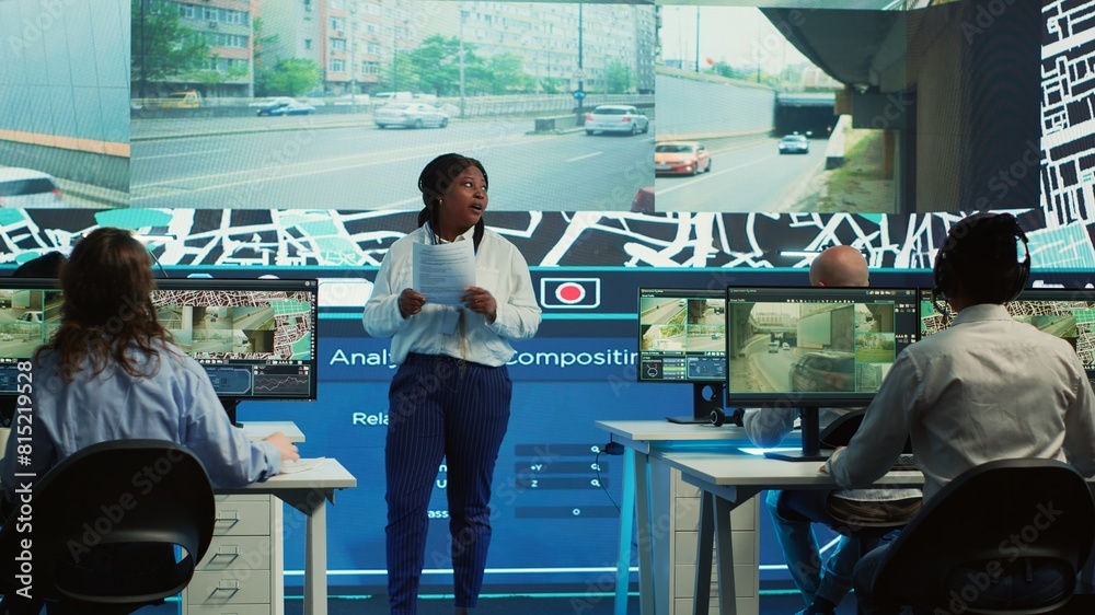 African american manager provides information for delivery parcels to ...