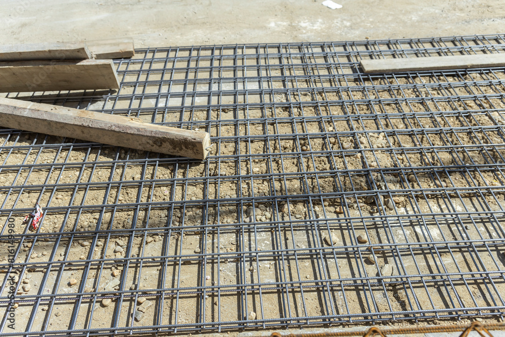 Photo Stock A close-up of a construction site with a grid of rebar laid ...