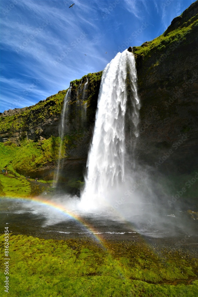 Seljalandsfoss waterfall drops 60 m and is part of the Seljalands river ...