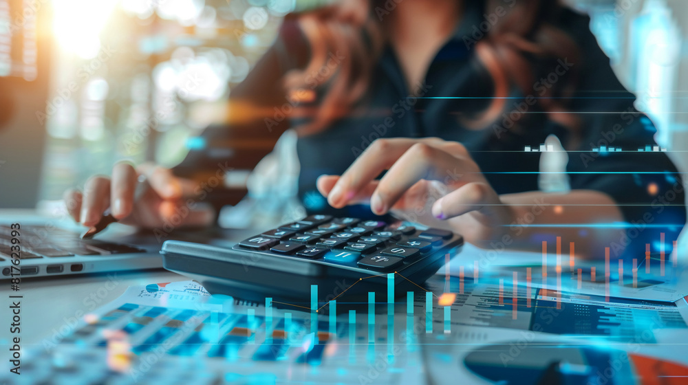 Business finance and accounting concept. Businesswoman using calculator ...
