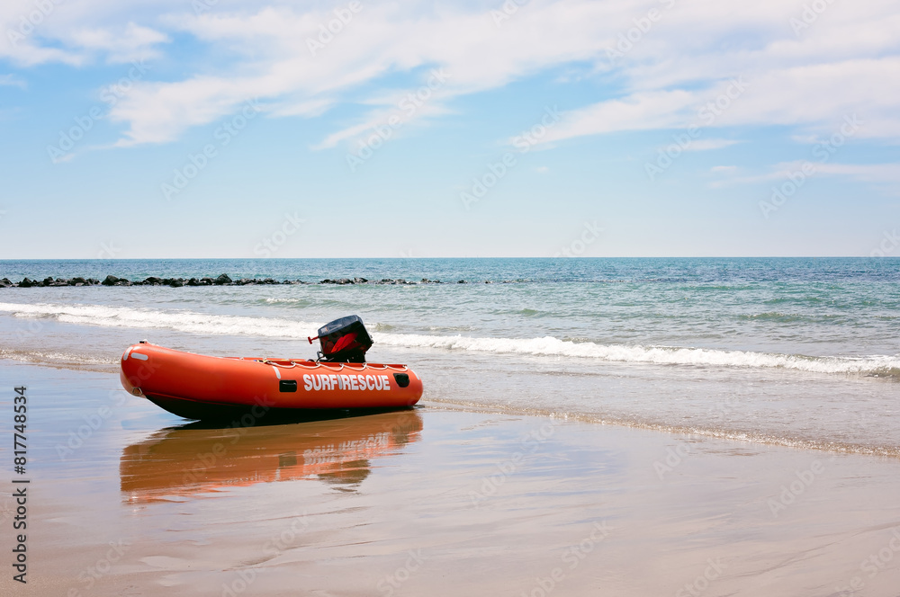 surf rescue inflatable boat dinghy, lifesaver lifesaving, beach ocean ...