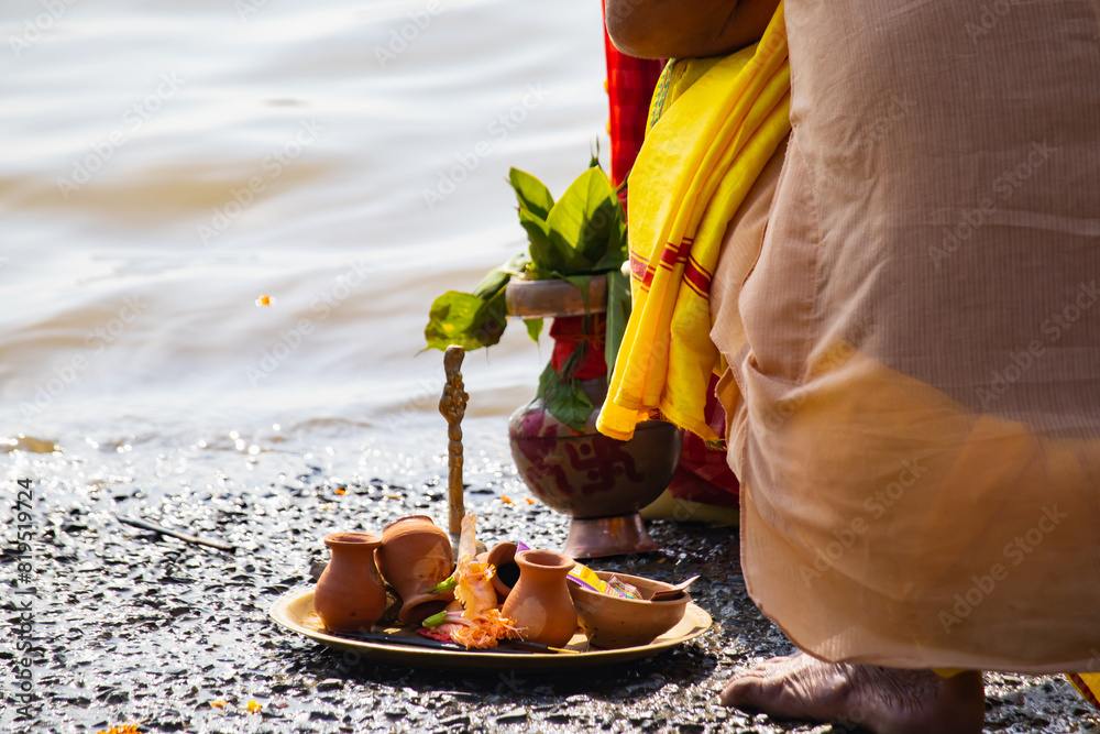 Hindu puja rituals being performed by priest with copper vessels, mango ...