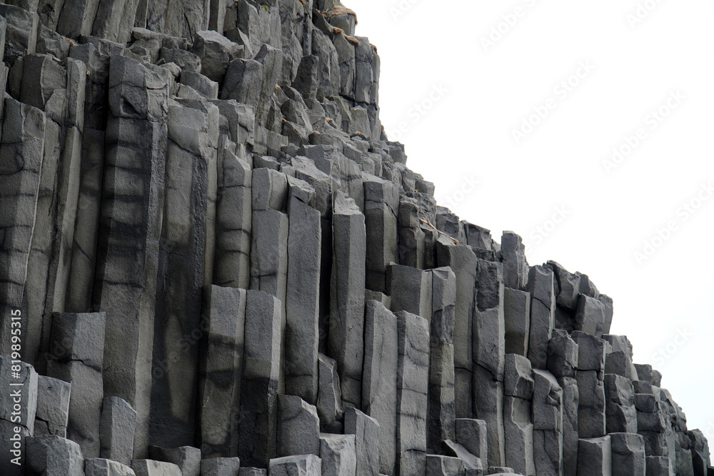 Vertical basalt column background pattern, showing the geometric ...
