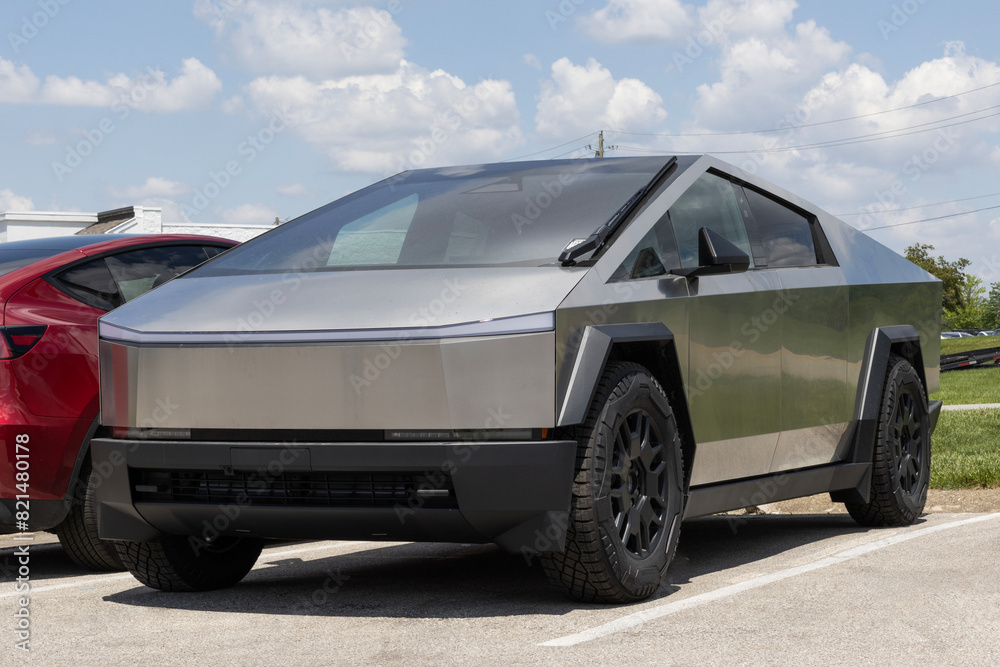 Tesla Cybertruck display at a dealership. Tesla claims the Cybertruck ...