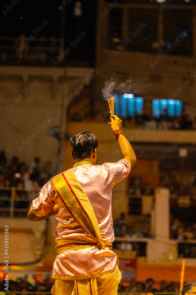 Ganga aarti, Portrait of young priest performing holy river ganges ...