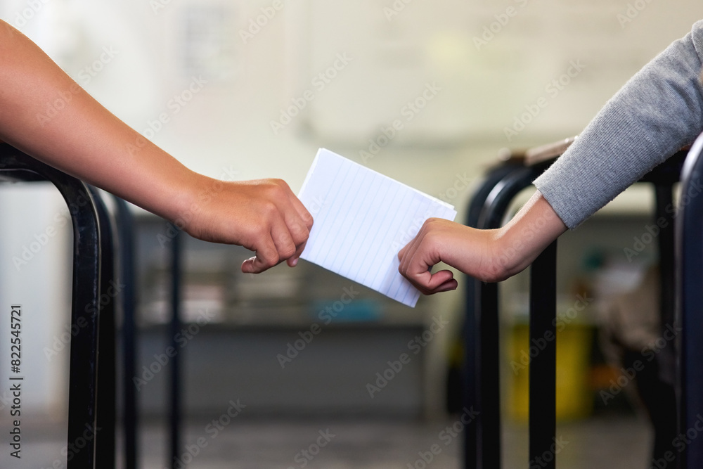 Students, hands and cheating with paper in classroom for communication ...