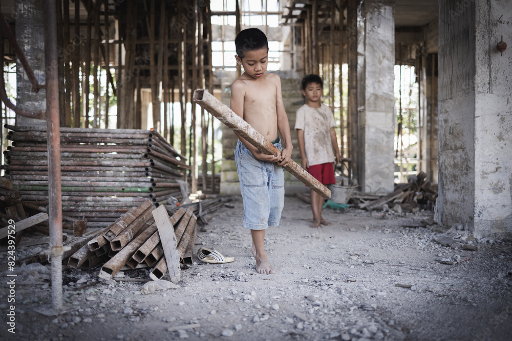 Two poor children are forced to work in construction. Poor children ...