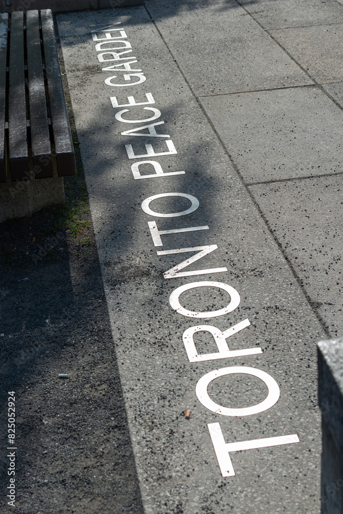 metal letters cast in place at the Toronto Peace Garden located at ...