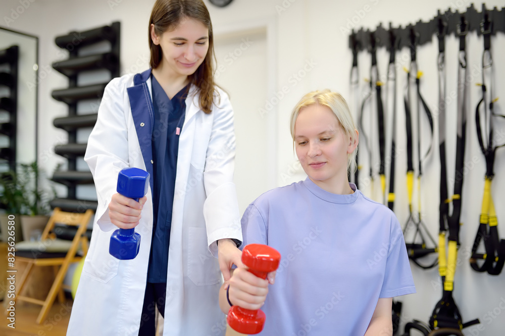 The rehab doctor conducts the patient's appointment in the gym. The PMR ...