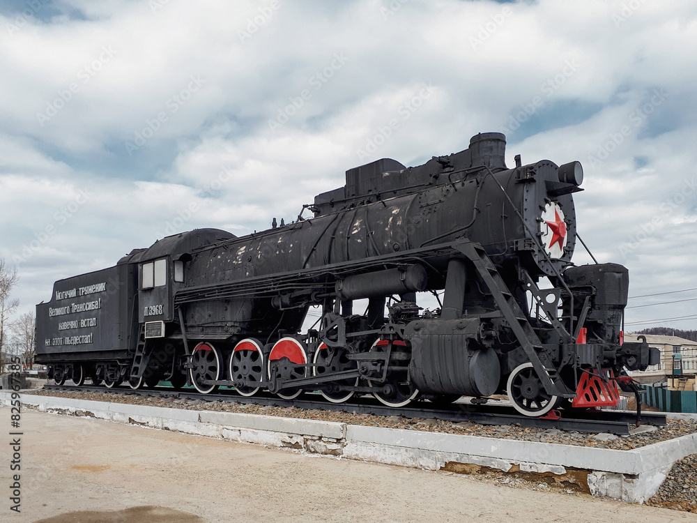 Steam locomotive-monument, Mogocha railway station, Transbaikal region ...