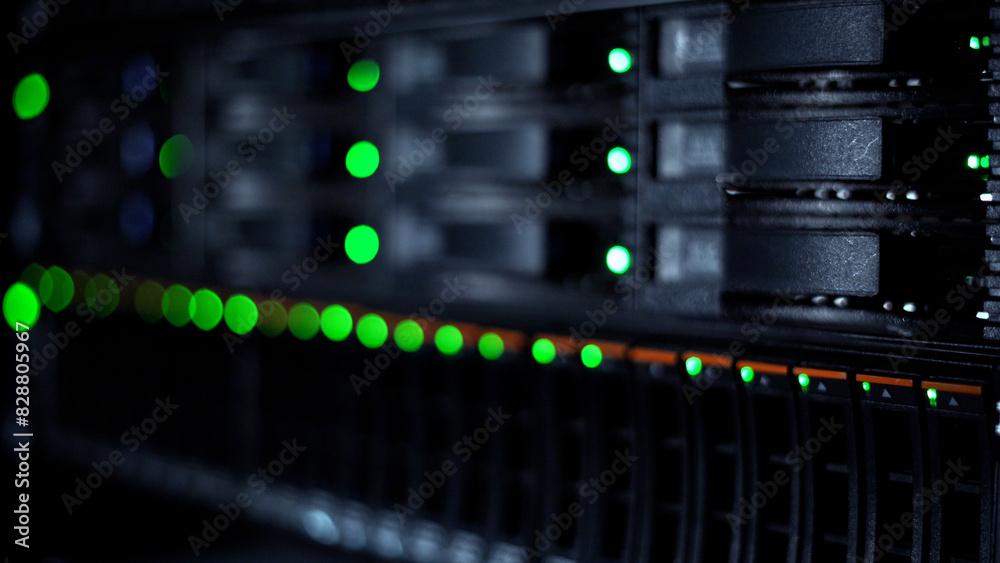 A detailed view of a server rack in a data center, displaying active ...
