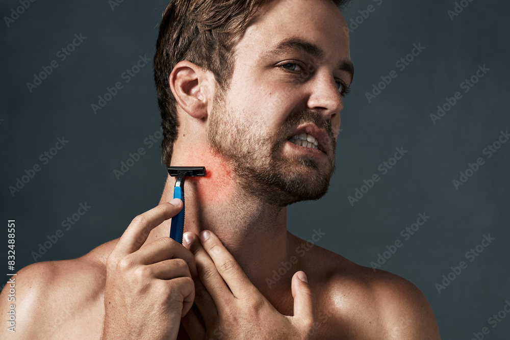 Razor, shaving or man in studio with pain or hair removal for skincare ...