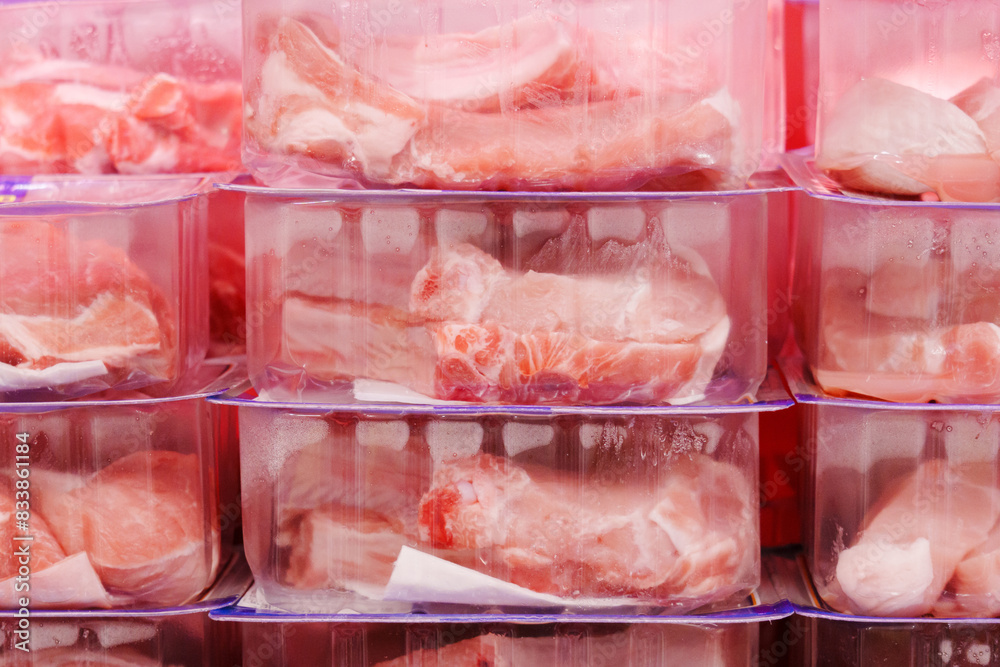 Pile of Plastic Meat Containers meat, ready for processing or ...