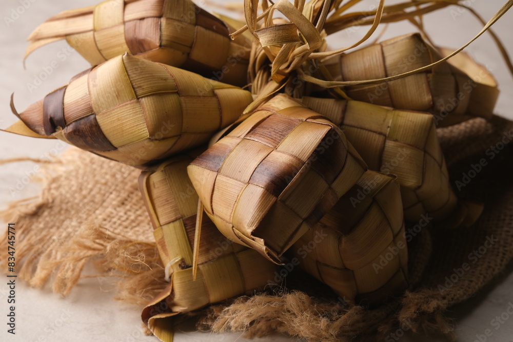 Ketupat is a typical Javanese dish made from rice which is wrapped in a ...