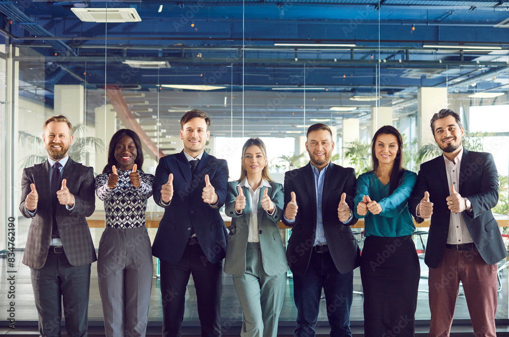 Group of multinational diverse business people showing thumbs up with ...