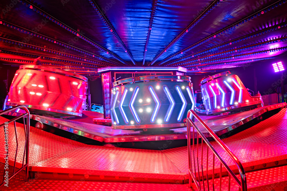 carnival show funfair ride, Bundaberg, night bright neon lights, techno futuristic leisure fun ...
