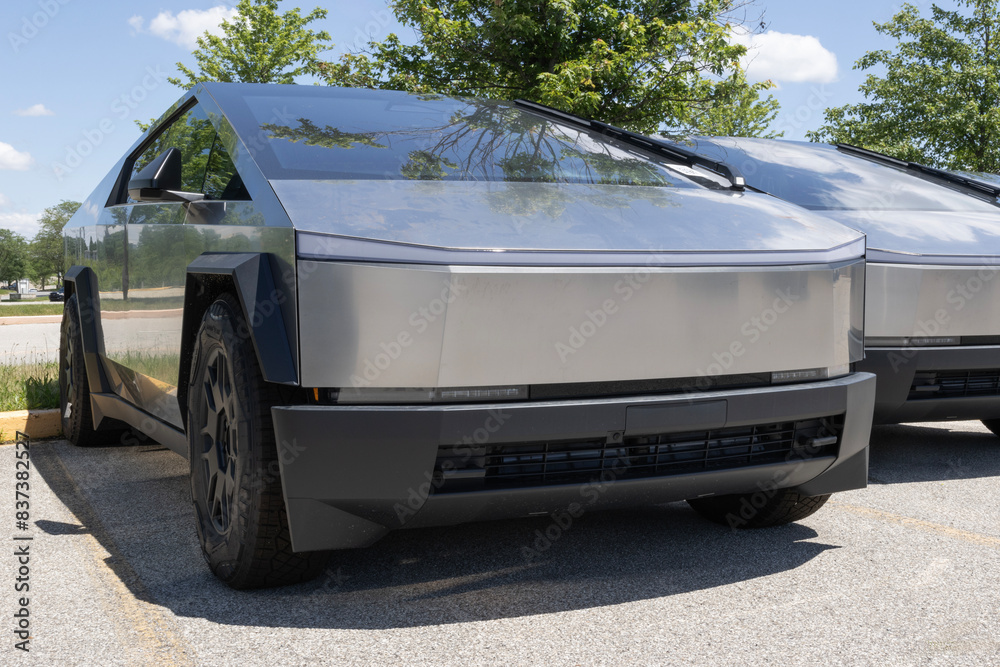 Fotografie Tesla Cybertruck display at a dealership. Tesla offers the ...