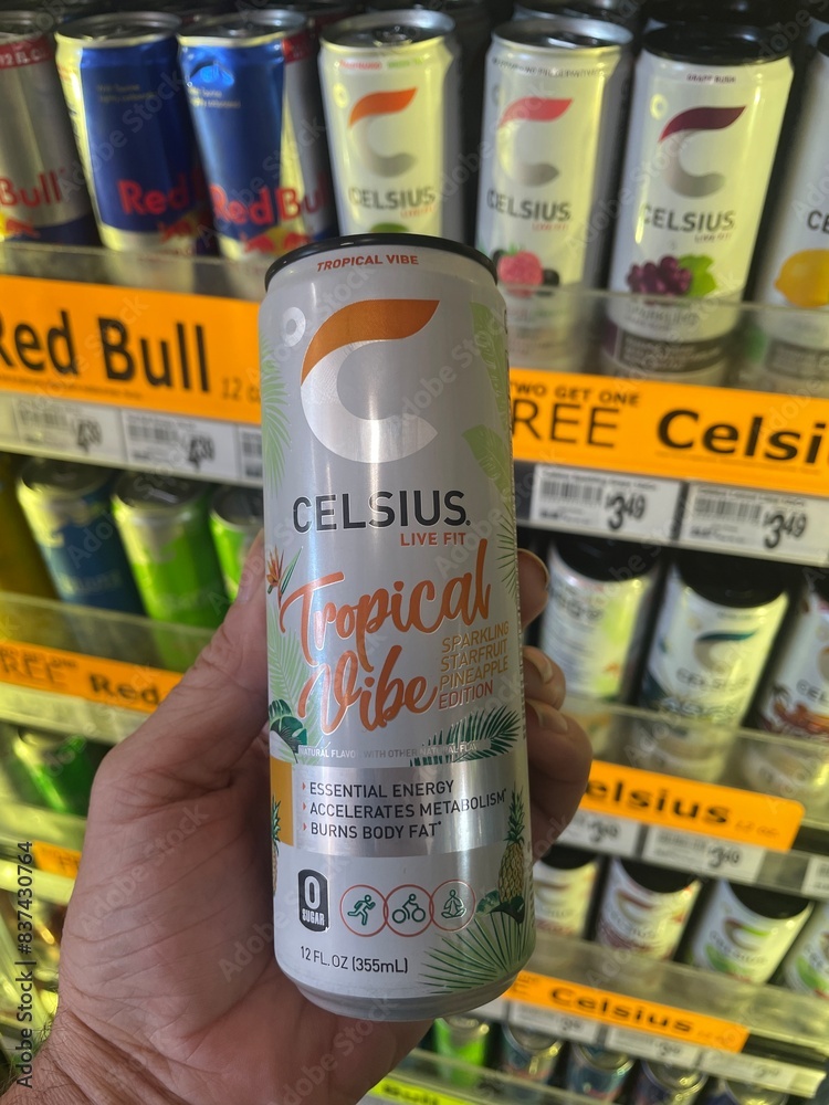 7 11 convenience store interior hand holding Celsius energy drink Stock ...