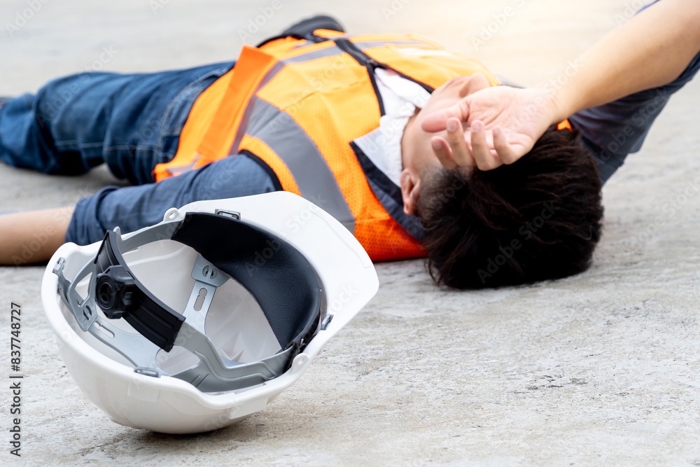 Accident and injury on a construction site. Safety first concept. Male ...