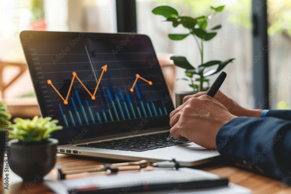 Investment strategy planning. Businessperson hands use a laptop with ...