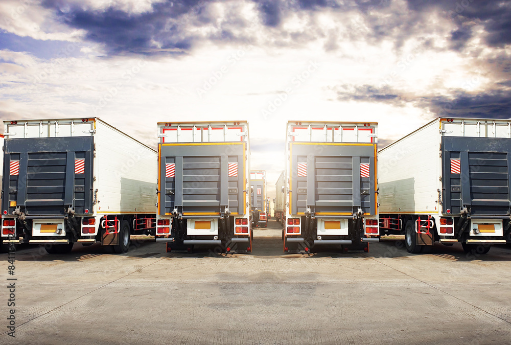 Container Trucks on The Parking Lot with The Sunset Sky. Cargo ...