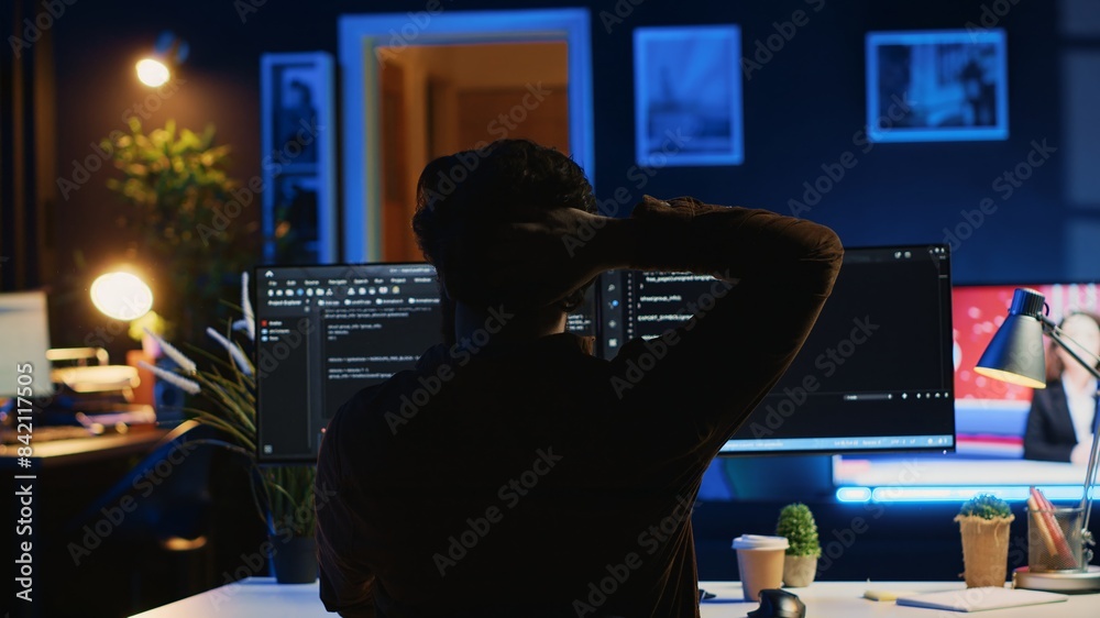 Software Technician Frustrated While Updating Complex Binary Code Script On Computer At Home