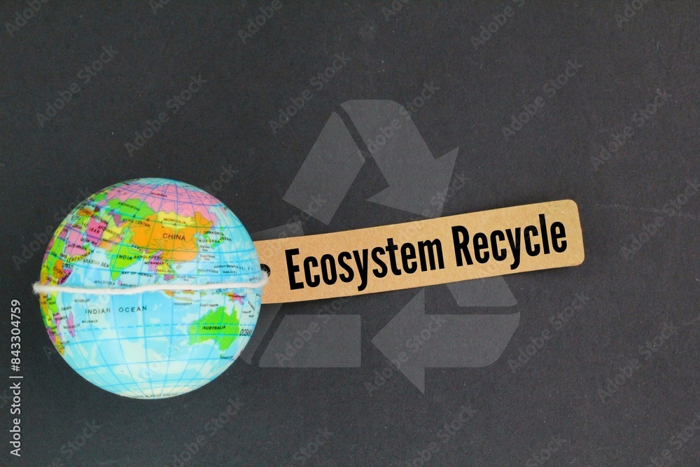 landforms and paper tags with the words ecosystem recycle. ESG concept ...