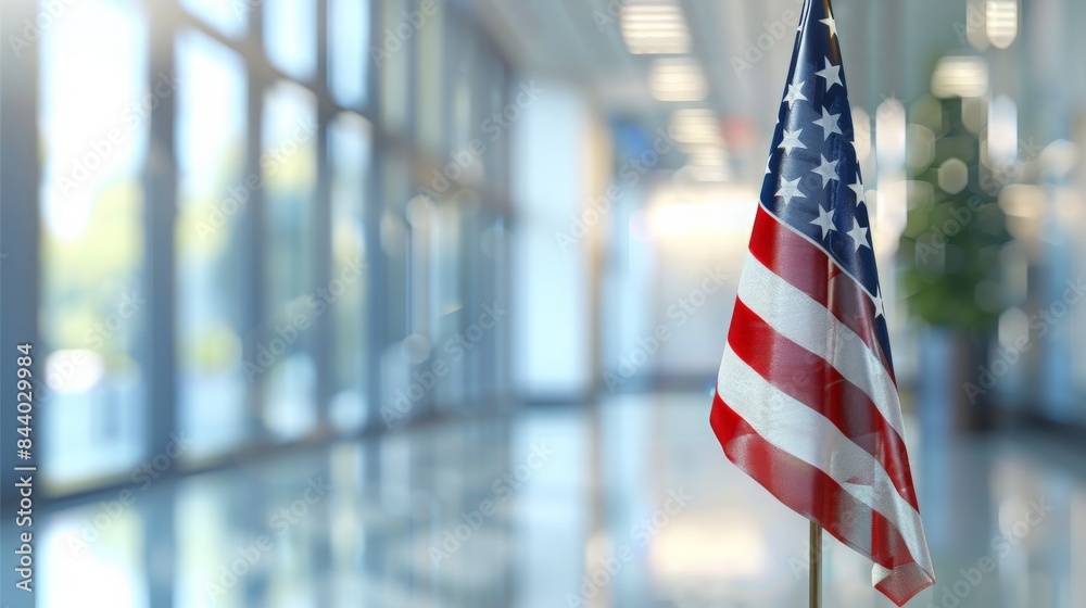 American Flag Indoors: Blurred Office Background with USA National ...