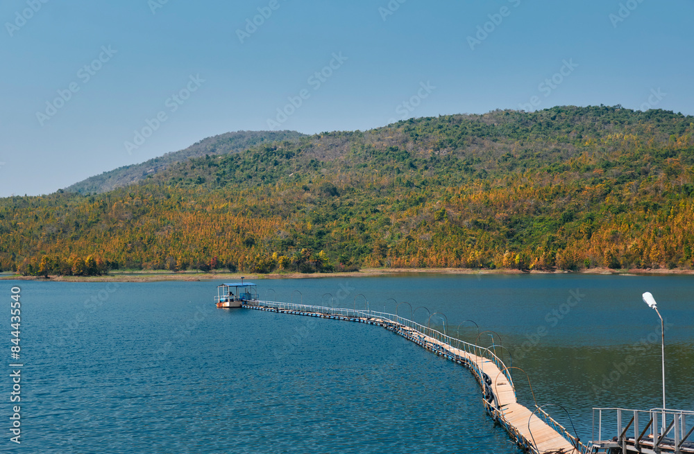 serene waters of lake amidst hilly landscape of Bughmundi, Purulia ...