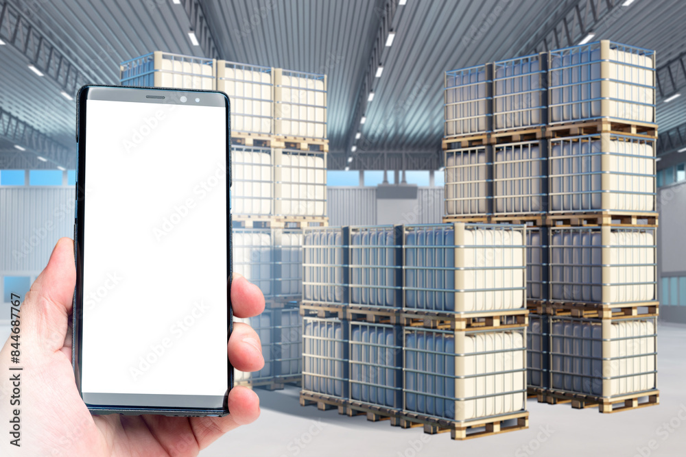 Phone inside warehouse. Mock up smartphone. Warehouse with liquid ...
