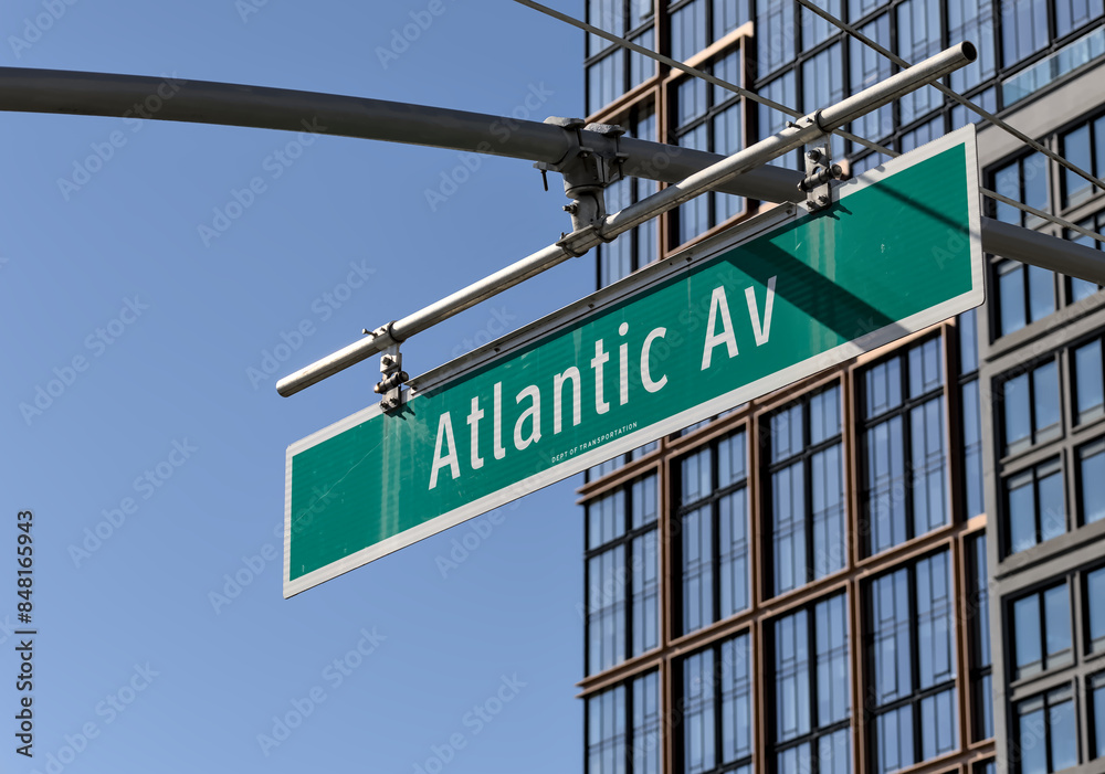 Atlantic avenue sign on street light traffic light lamp post in ...