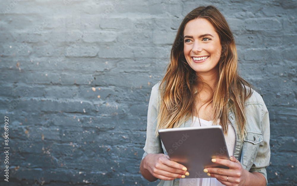 Smile, thinking and tablet with developer woman on brick wall ...