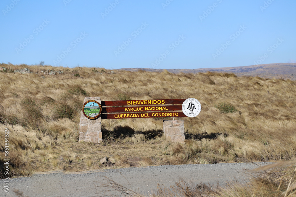 Entrance and welcome sign to the Quebrada del Condorito National Park ...