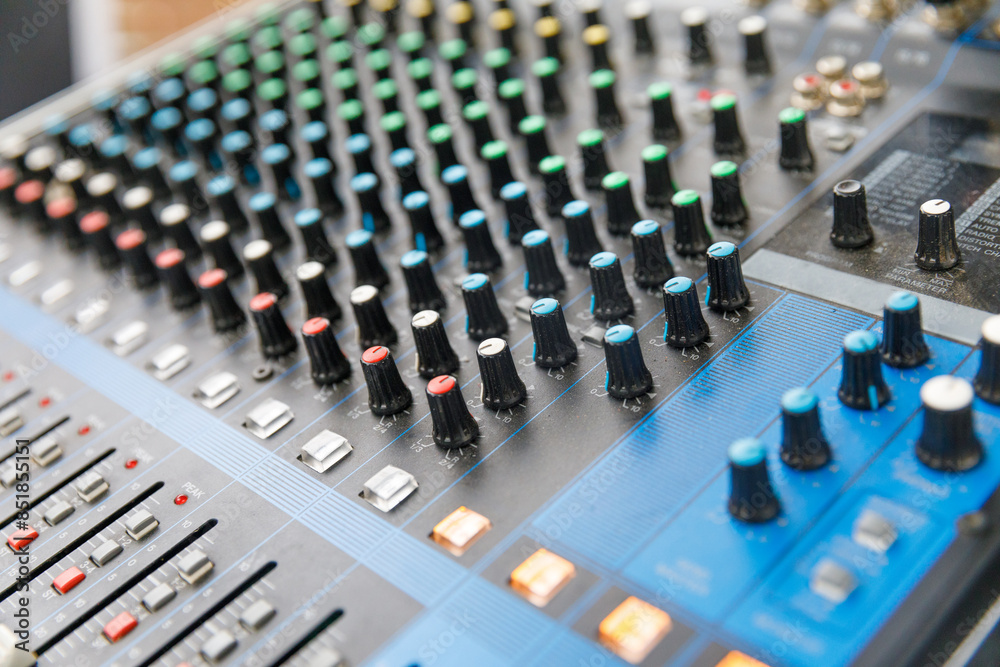 Professional audio mixing console with faders and adjusting knobs, TV ...